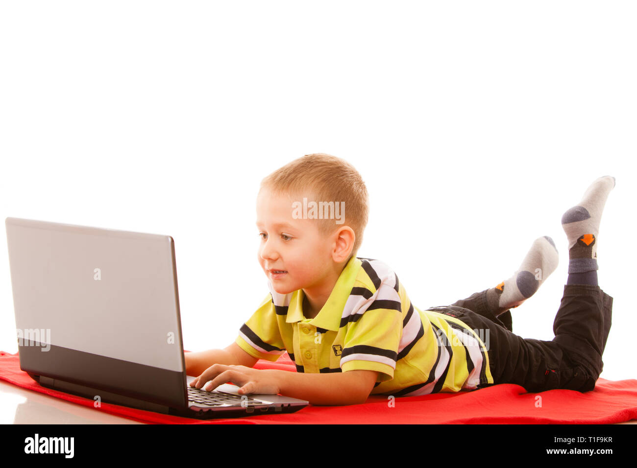Education, school, technology and internet concept - little student boy ...