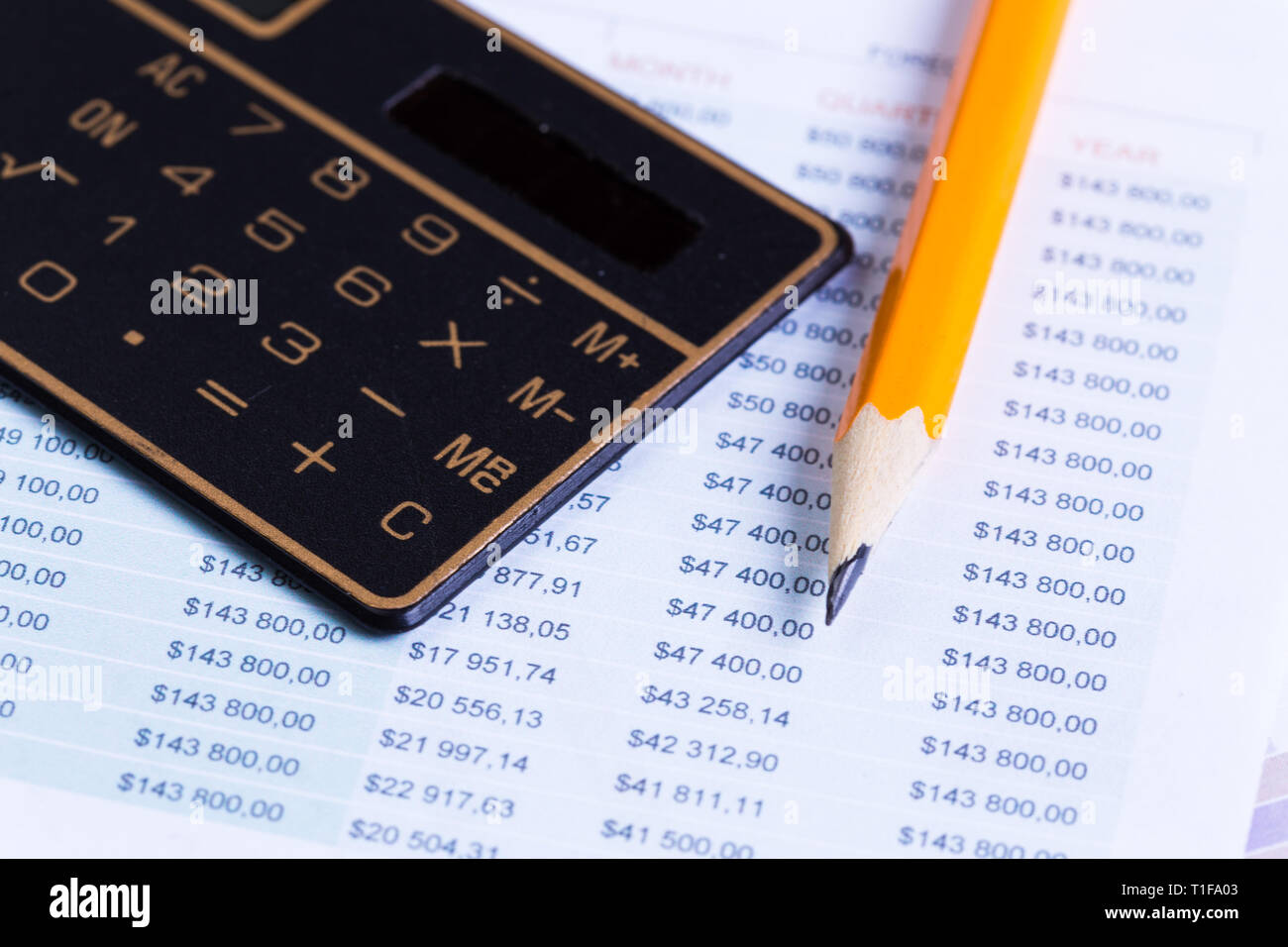 Graphs and Calculator Stock Photo - Alamy