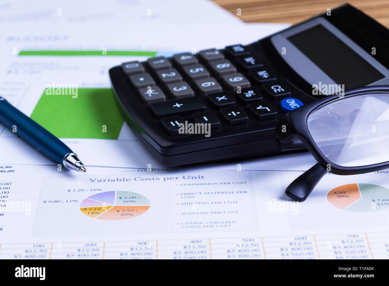 Graphs and Calculator Stock Photo - Alamy