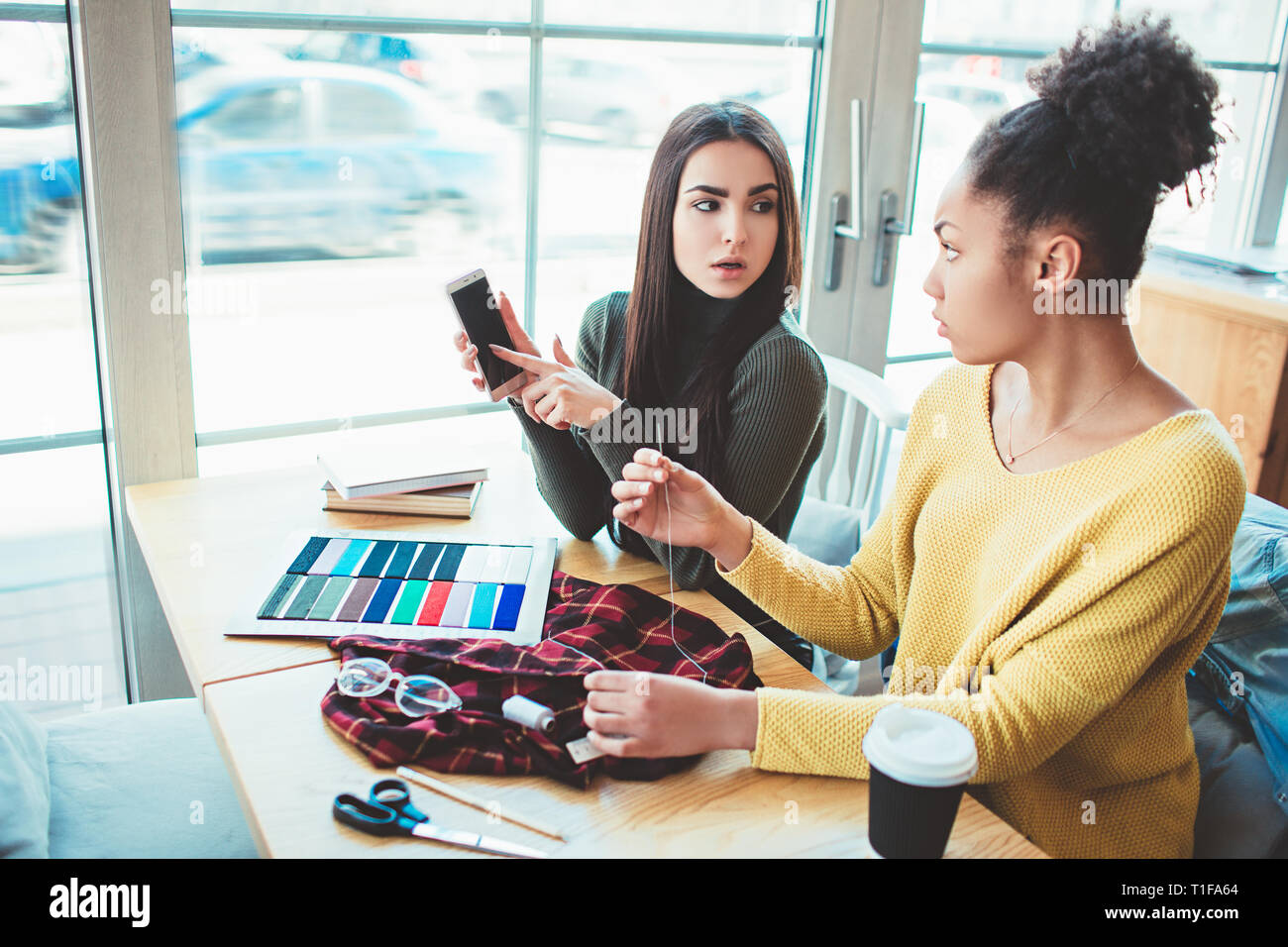Girls in cafe Stock Photo - Alamy
