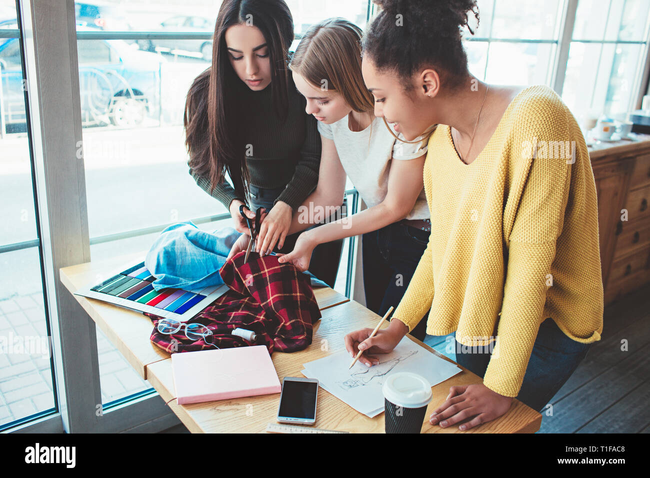 Girls in cafe Stock Photo - Alamy