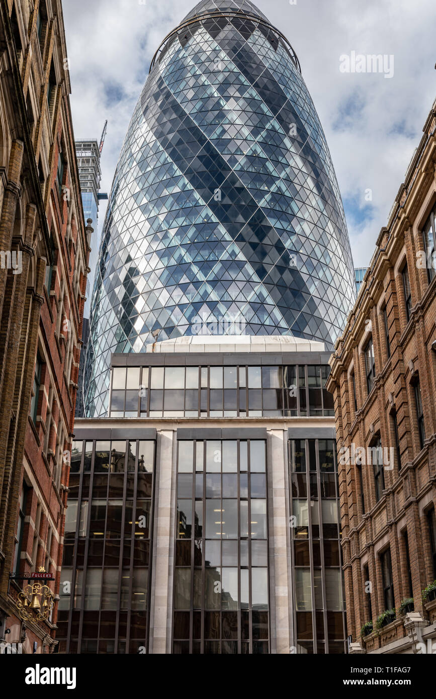 The "Gherkin" (30 St Mary Axe) towers over the more traditional ...