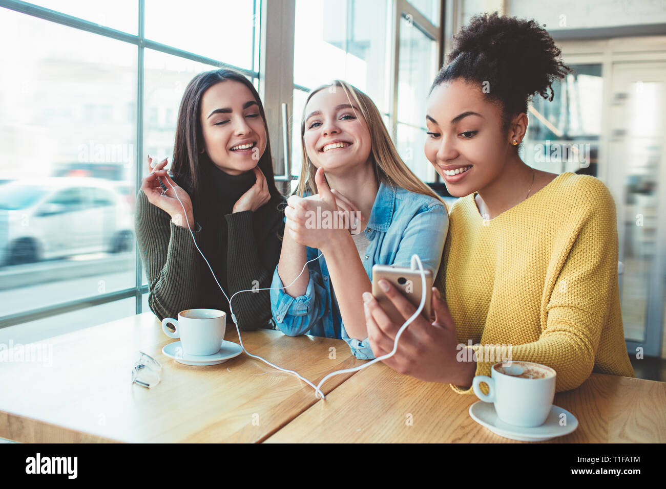 Girls in cafe Stock Photo - Alamy