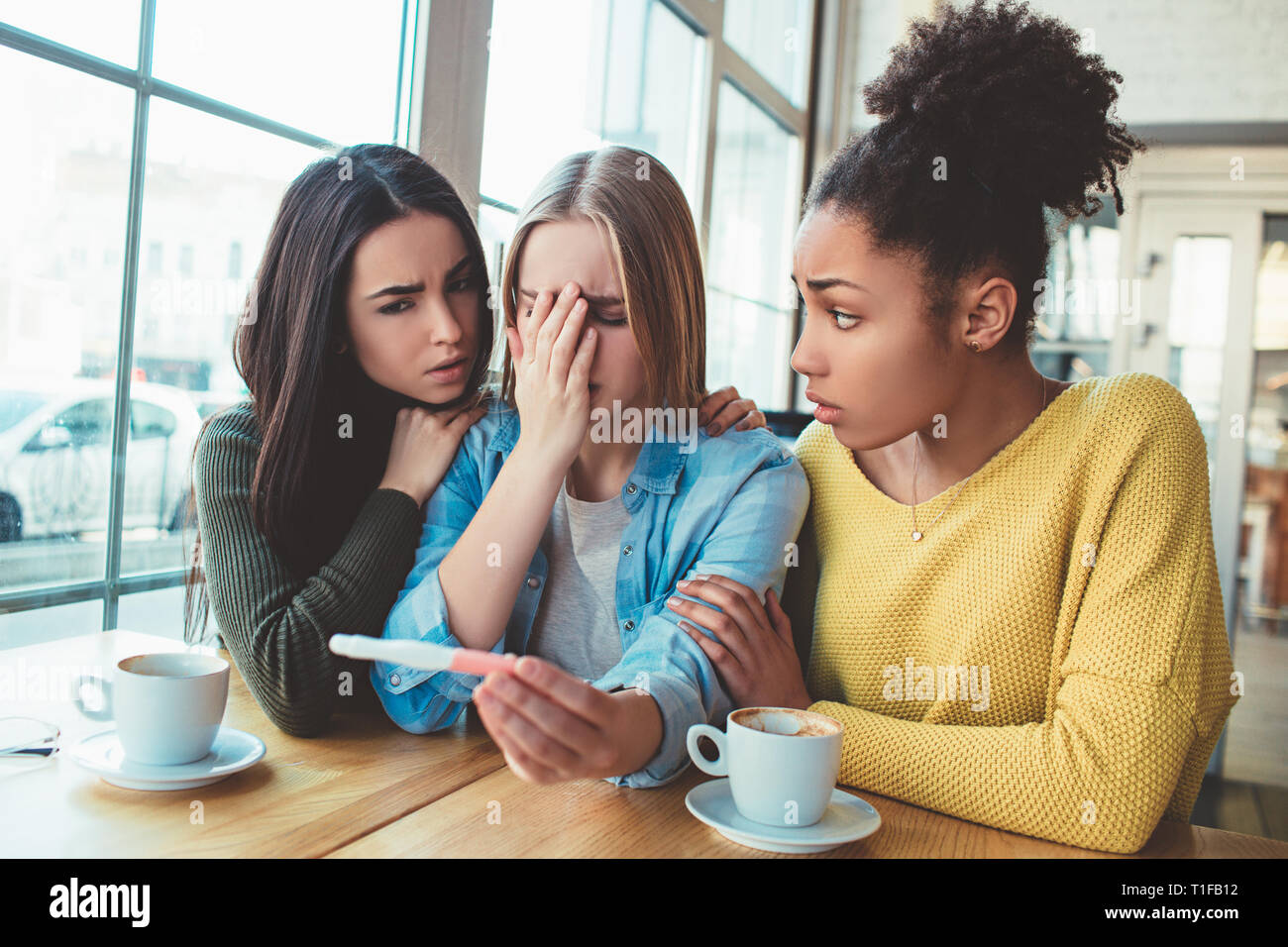 Girls in cafe Stock Photo - Alamy