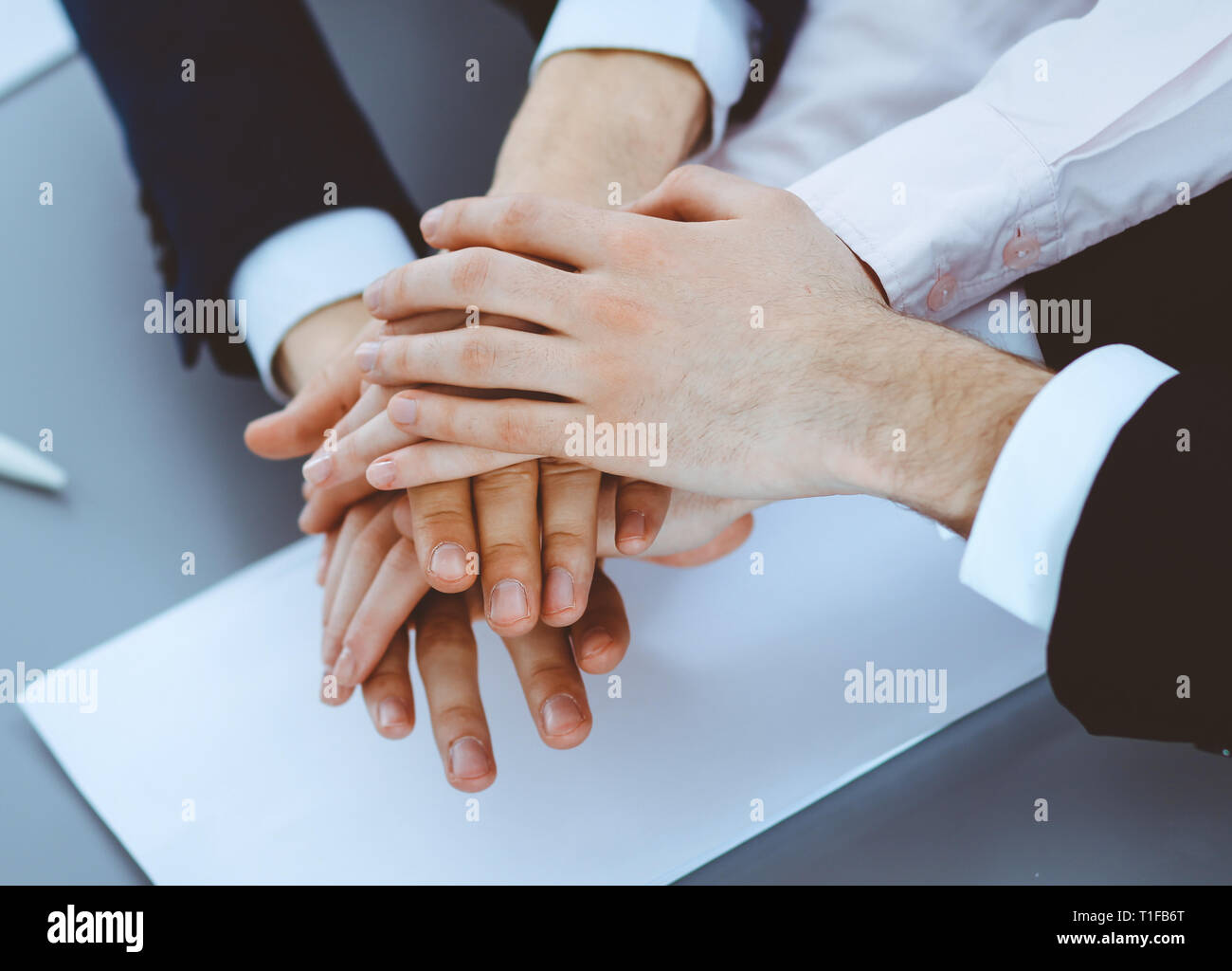 Business people group joining hands. Teamwork or meeting concepts Stock ...