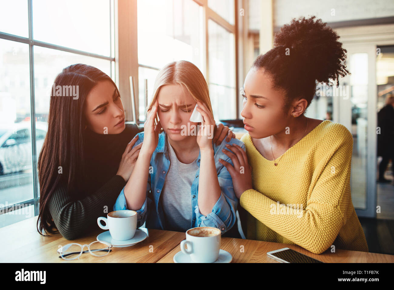 Girls in cafe Stock Photo - Alamy