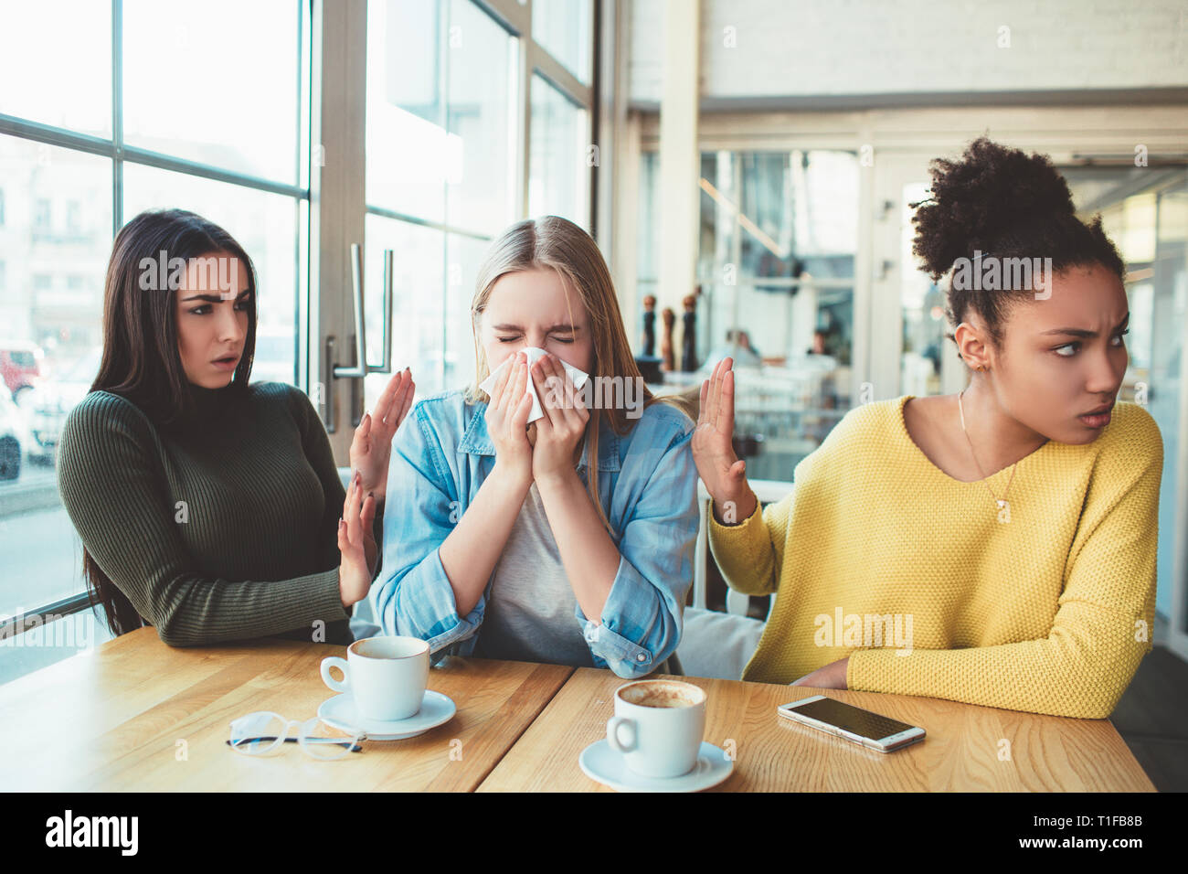 Girls in cafe Stock Photo - Alamy