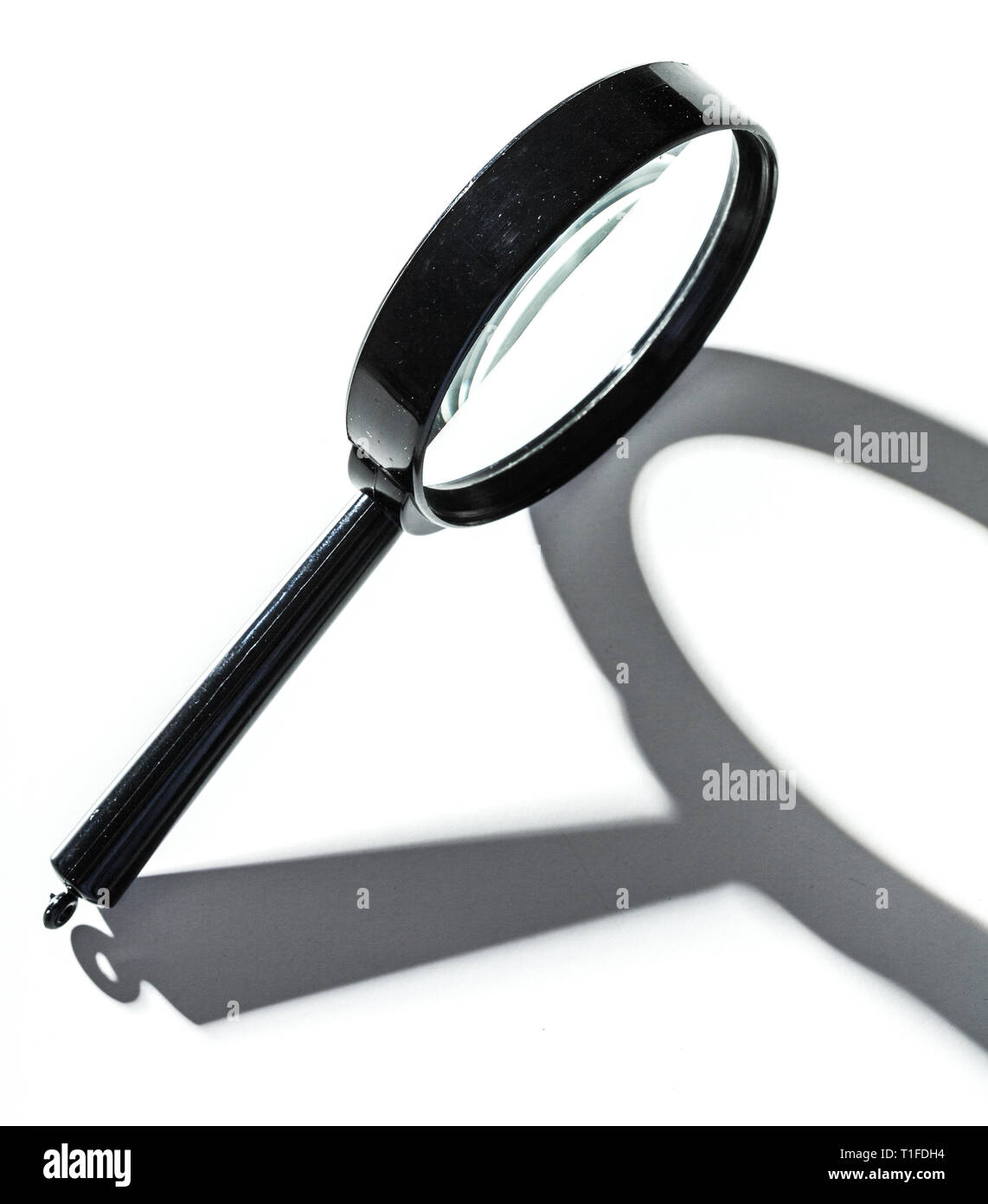 Magnifying glass isolated on white Stock Photo - Alamy