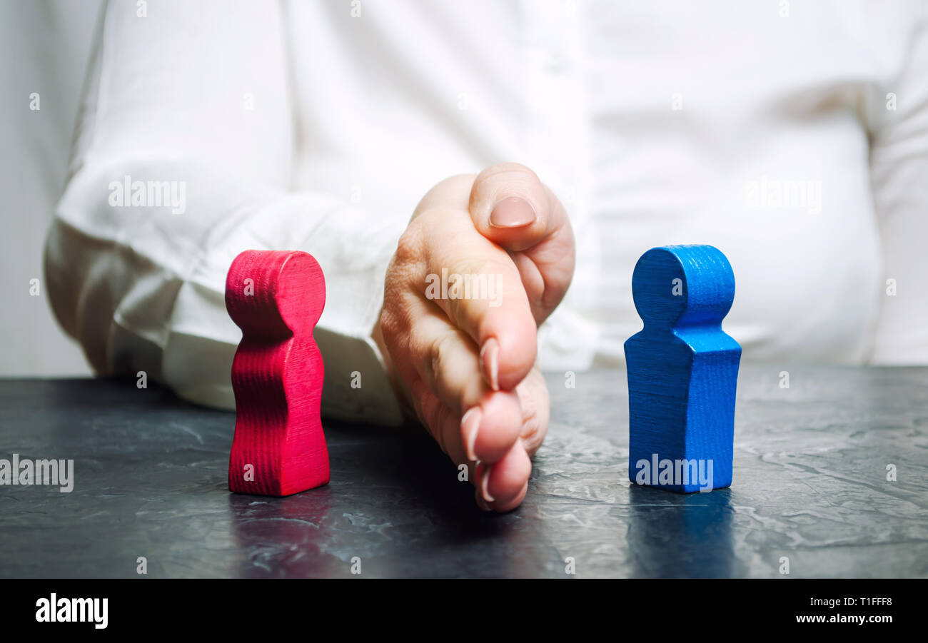 Hand separates man and woman. Violent separation. Break all ties. Help ...