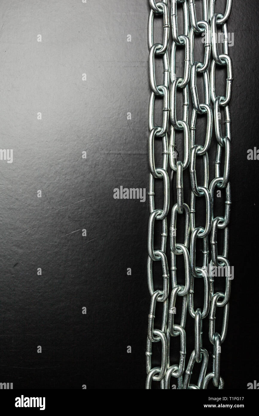 Strong chain black background Stock Photo - Alamy