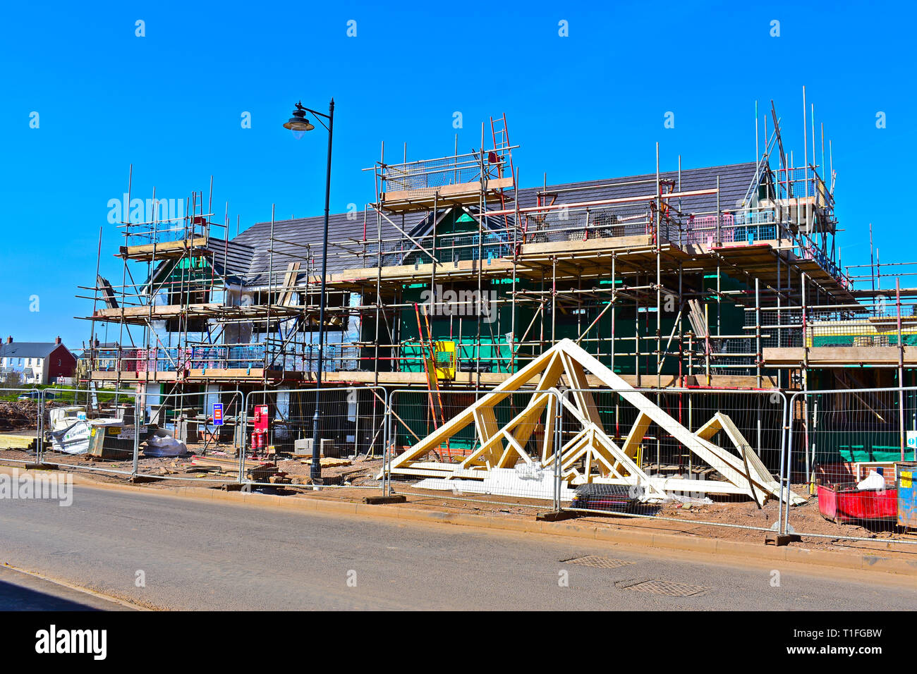 New Homes under construction. Building site with partially completed ...