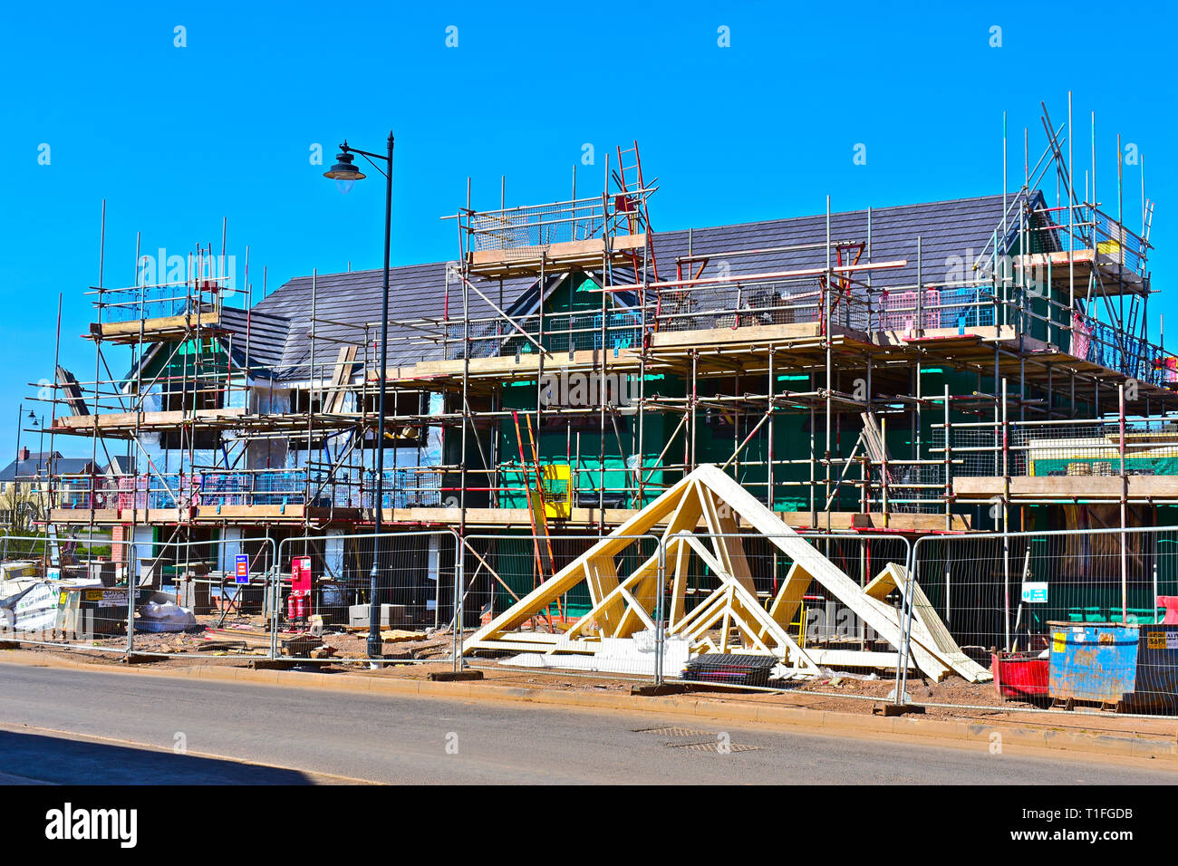 New Homes under construction. Building site with partially completed ...