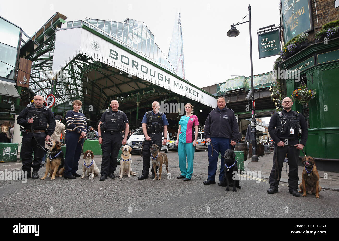 (Left to right) PD Marci with handler PC Neil Billany, PD Kai with ...
