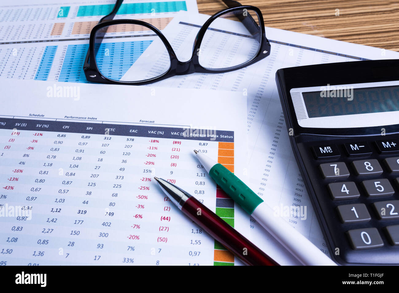Graphs and Calculator Stock Photo - Alamy