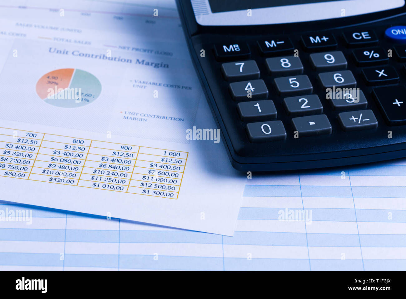 Graphs and Calculator Stock Photo - Alamy