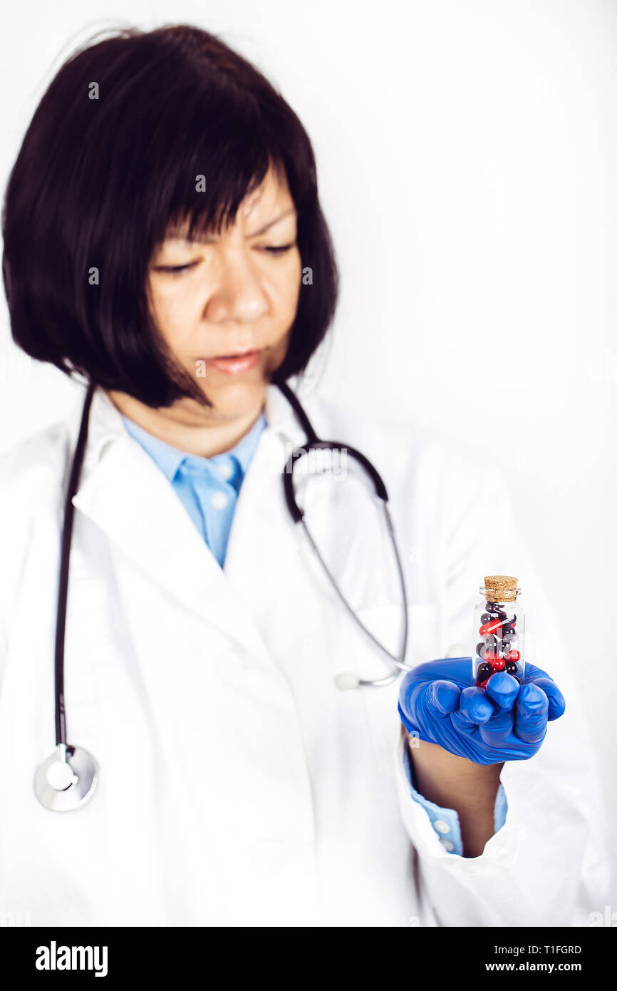 Image doctor showing bottle hi-res stock photography and images - Alamy