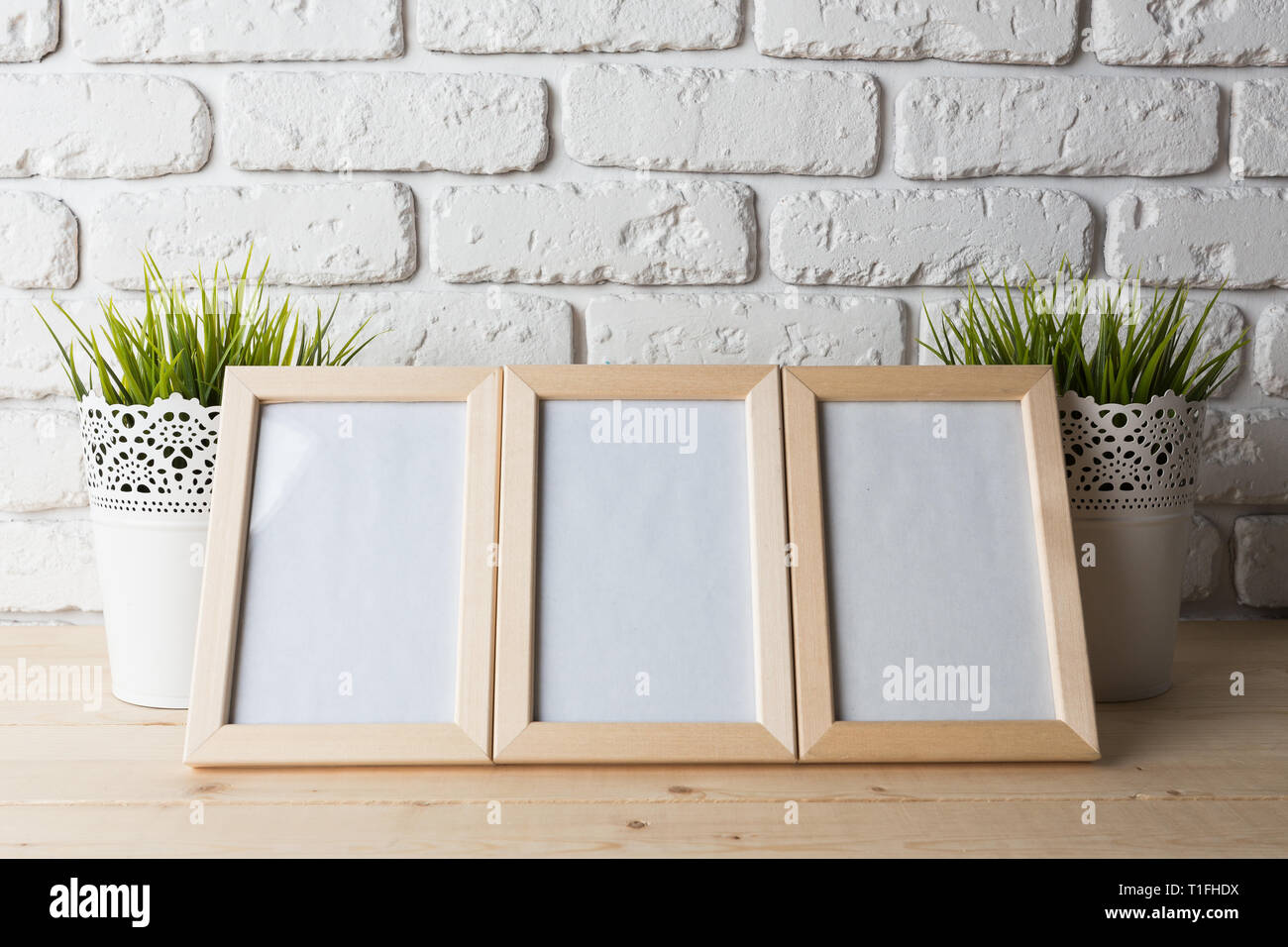 blank black picture frame on the wall Stock Photo - Alamy