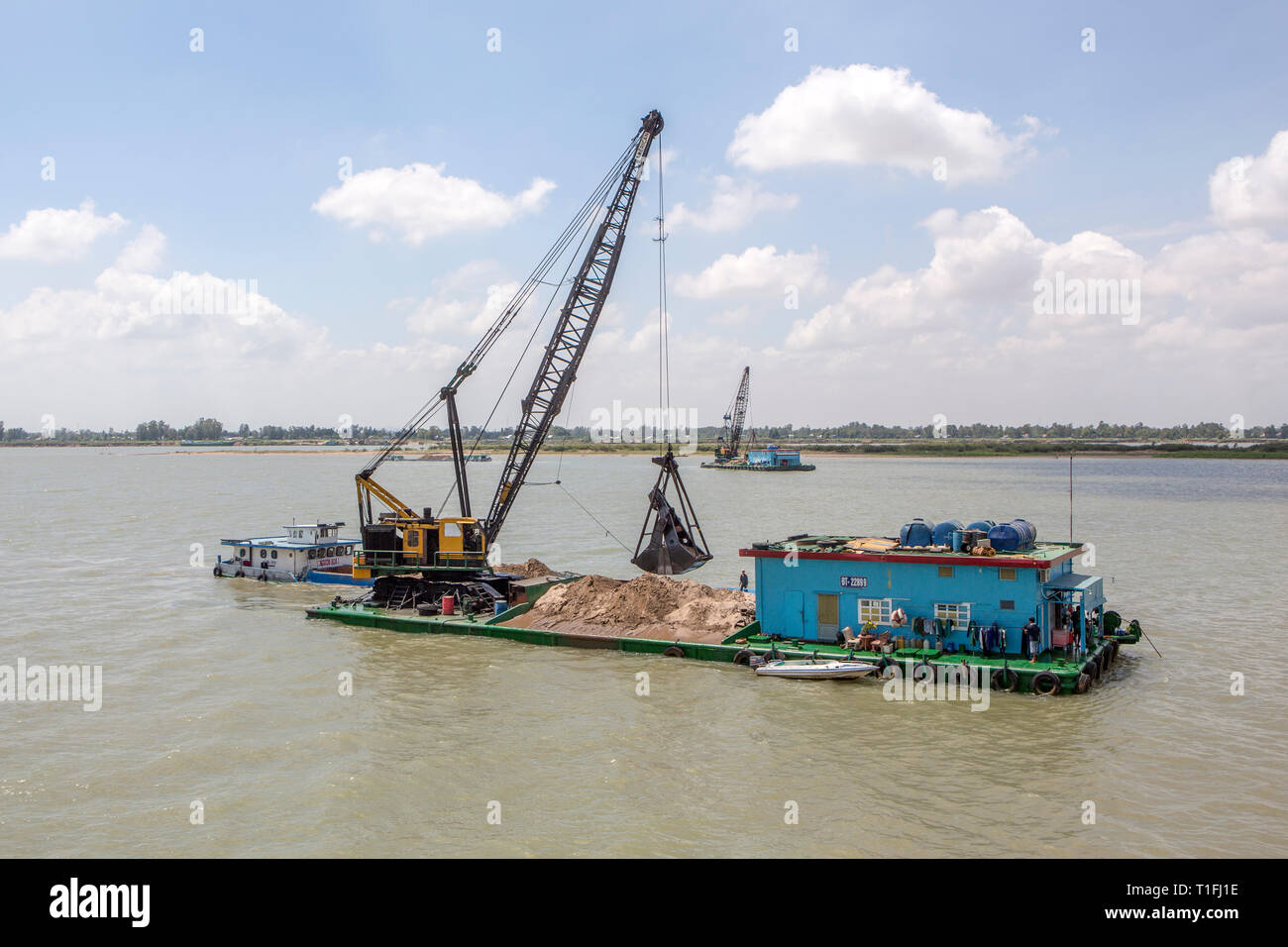 A dredger on the Mekong River, Vietnam Stock Photo - Alamy