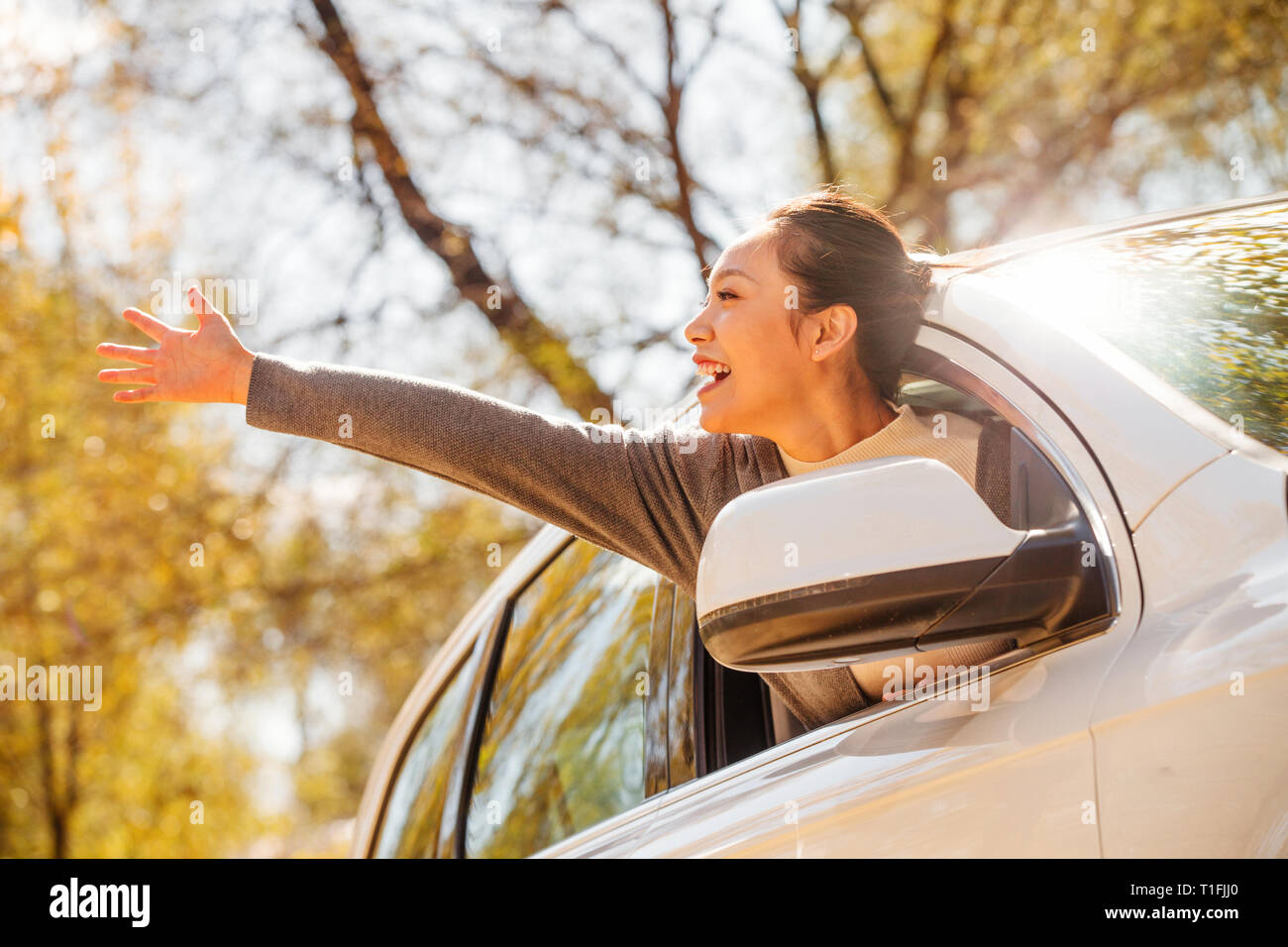 Young woman outdoor outing Stock Photo - Alamy