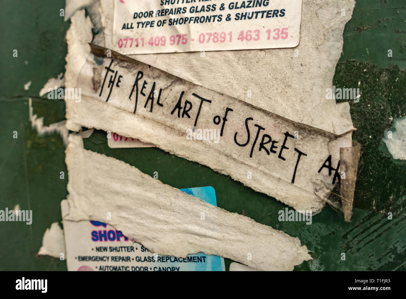 Edgy Graffiti Art sticker saying The Real Art of Street Art Stock Photo ...