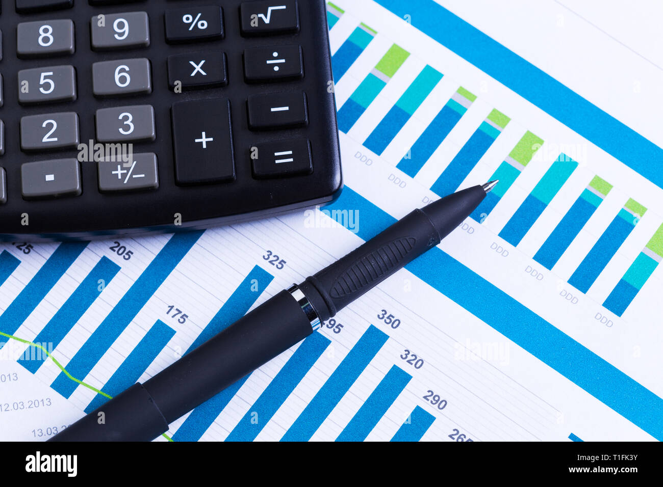 Graphs and Calculator Stock Photo - Alamy