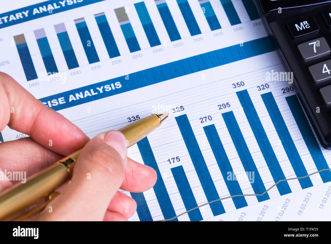 Graphs and Calculator Stock Photo - Alamy