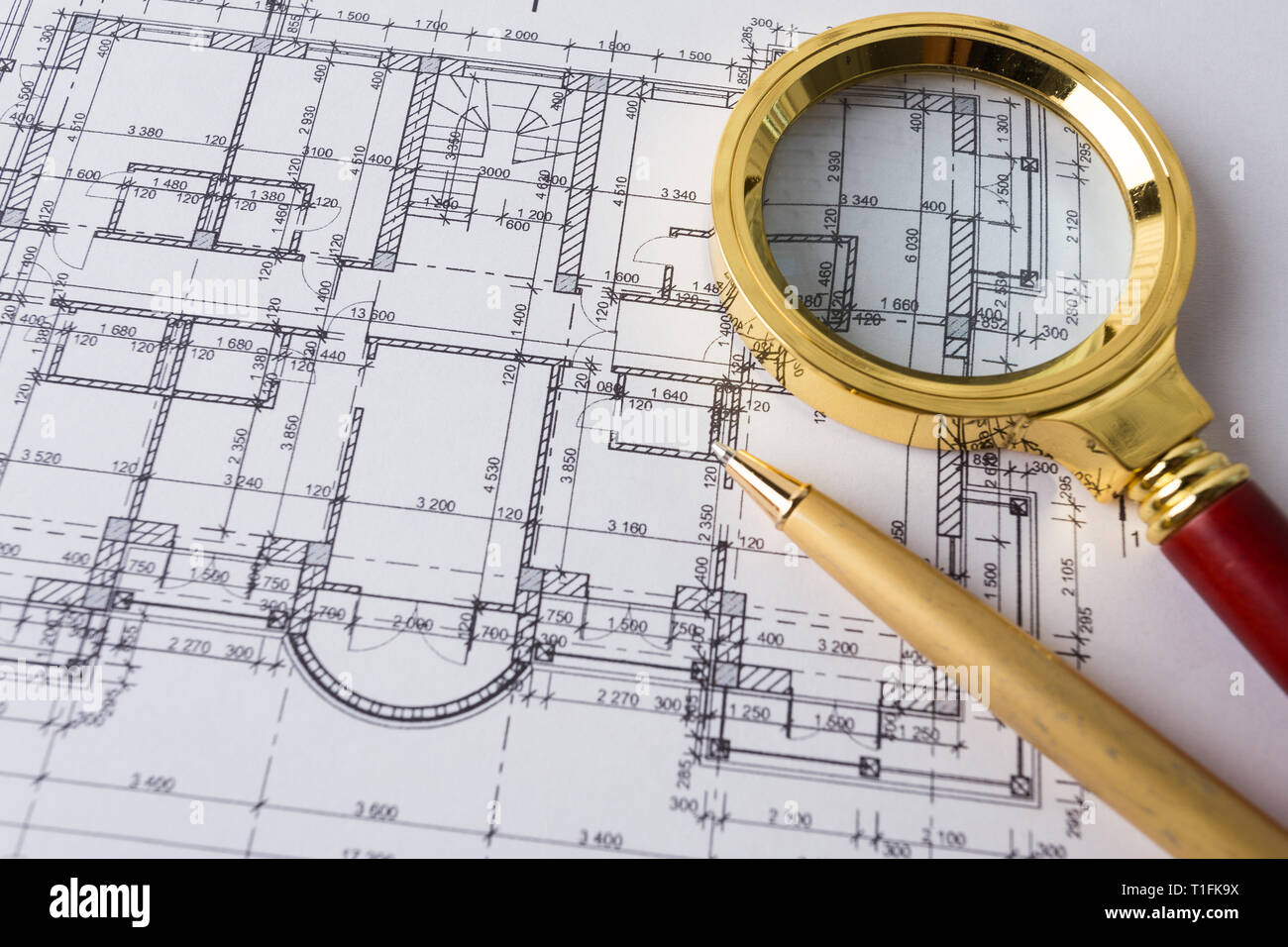 house plans & magnifying glass Stock Photo - Alamy
