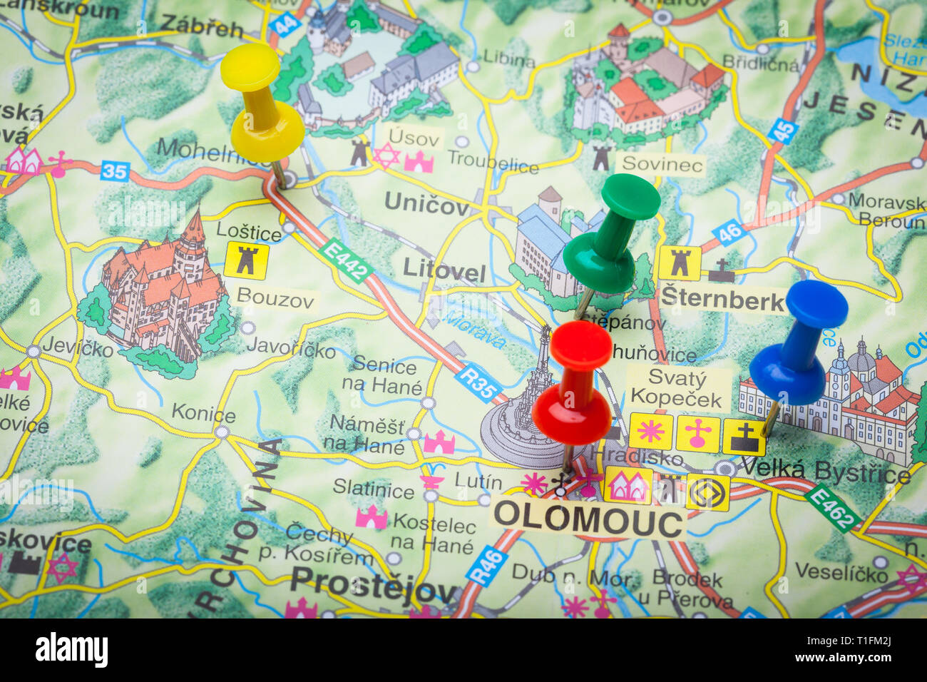 Travel destination points on a map indicated with colorful thumbtacks ...