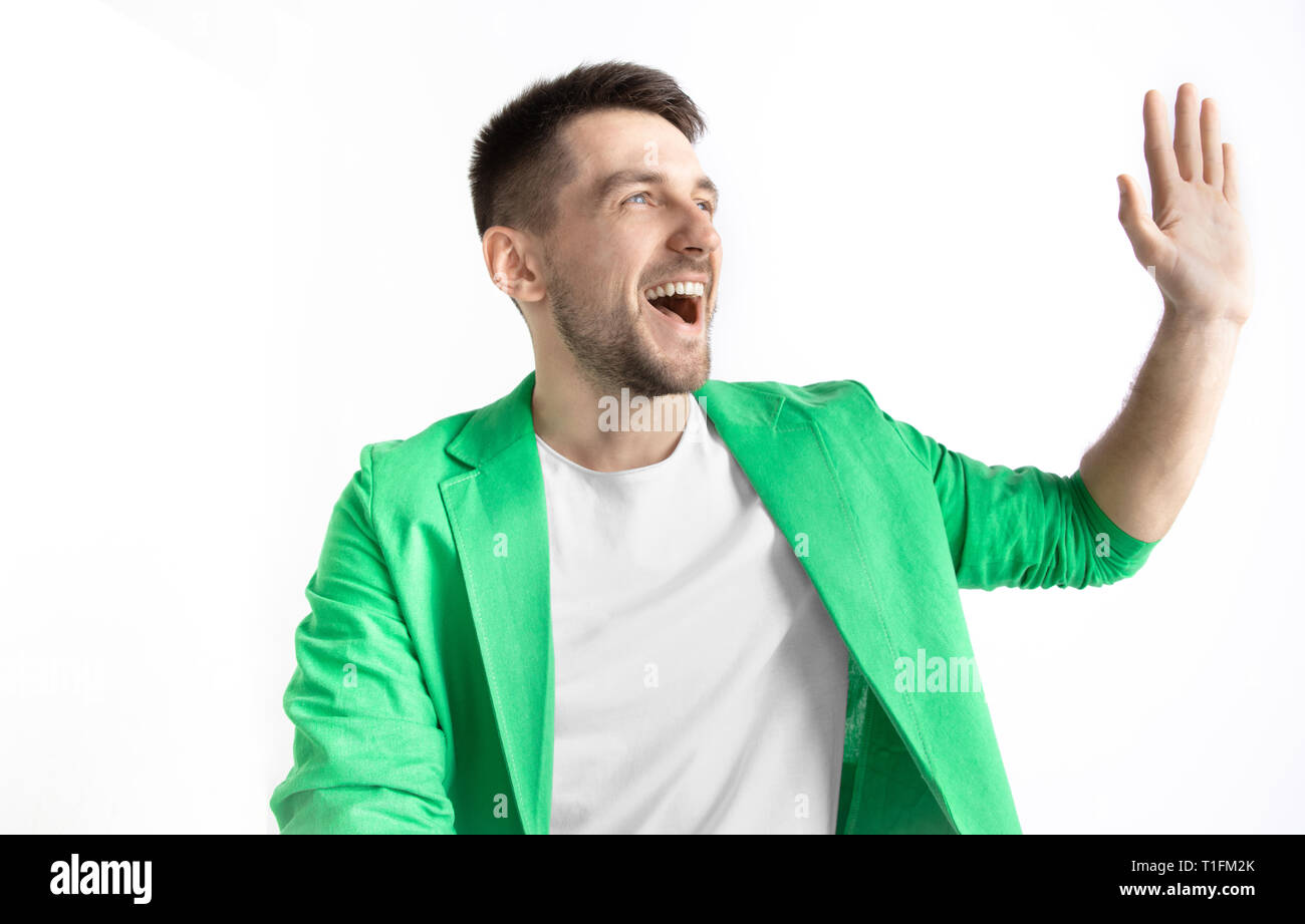 Happy business man standing, smiling isolated on gray studio background ...
