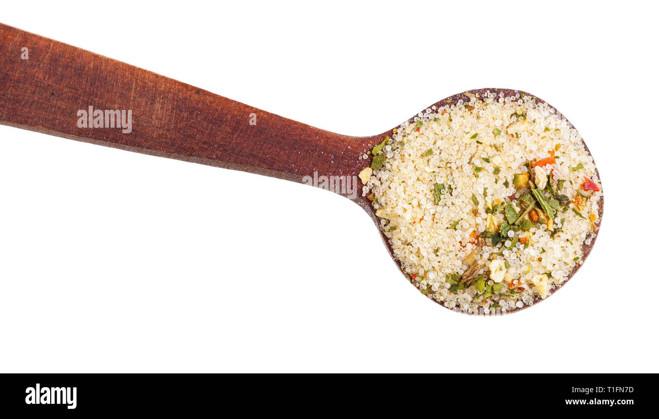 top view of wooden salt spoon with seasoned salt with dried vegetables ...