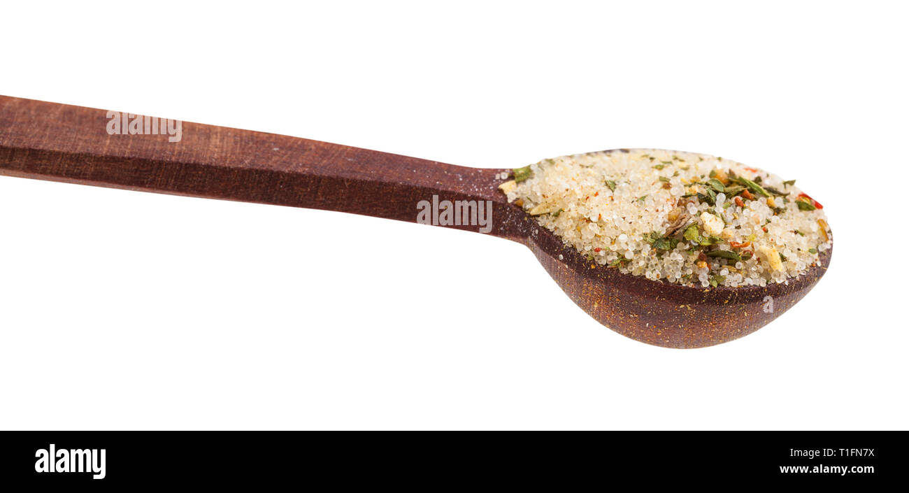 wooden salt spoon with seasoned salt with dried vegetables and flavours ...