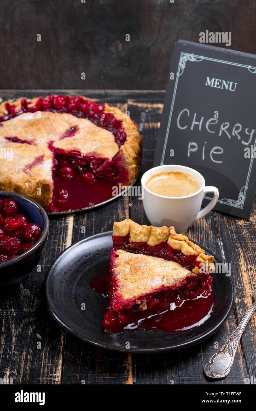 Cherry pie, cup of coffee and menu chalkboard Stock Photo - Alamy