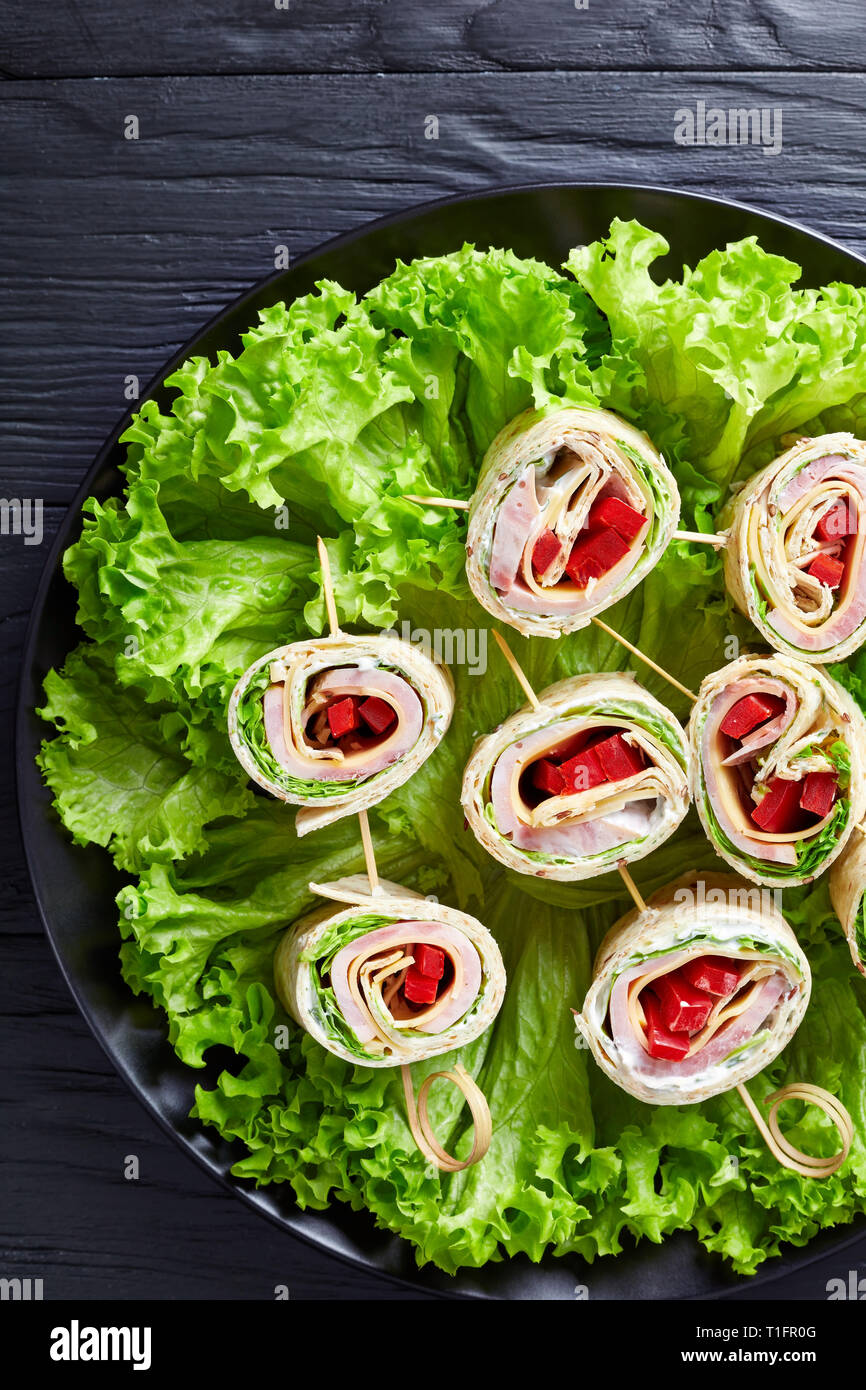 sliced sandwich wrap kebabs with whole grain flatbread layered with ham ...