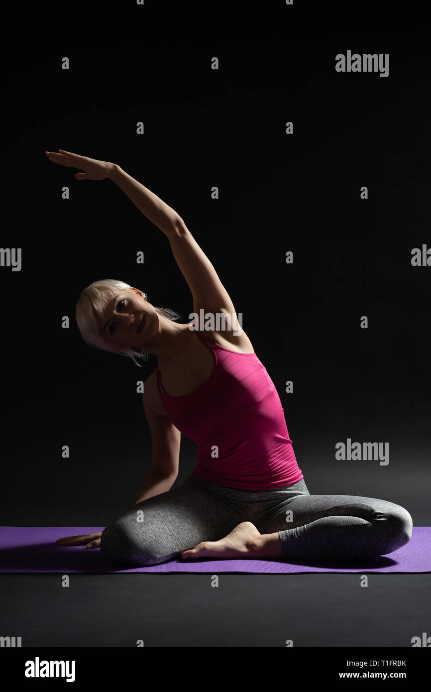 Woman exercising pilates. Mermaid exercise Stock Photo - Alamy