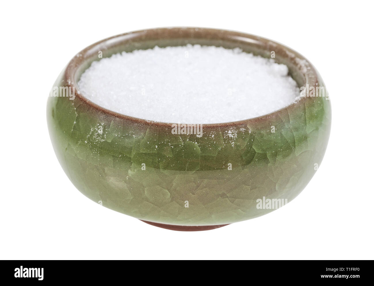 side view of ceramic salt cellar with fine ground Sea Salt isolated on ...