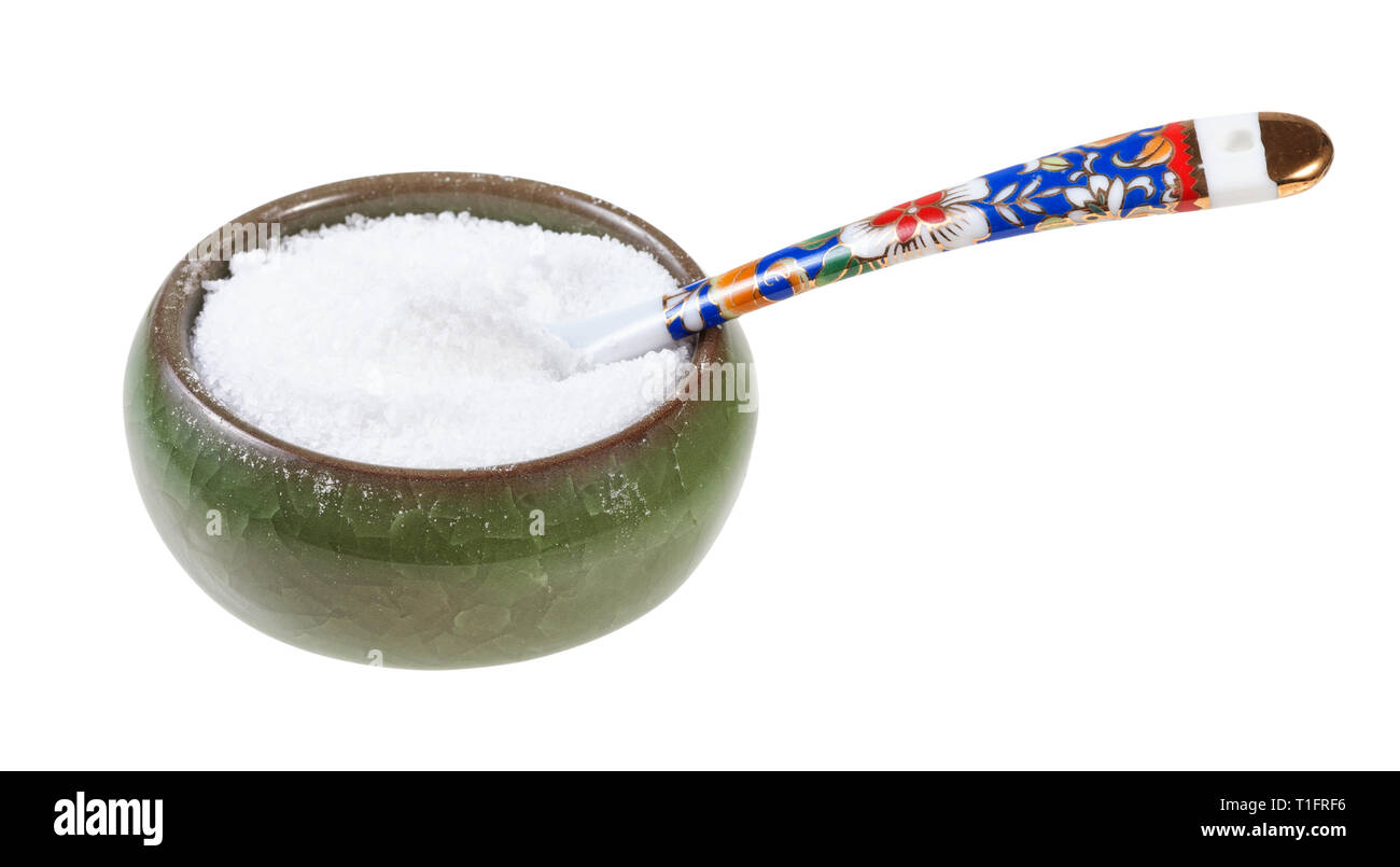 side view of ceramic salt cellar with spoon with fine ground Sea Salt ...