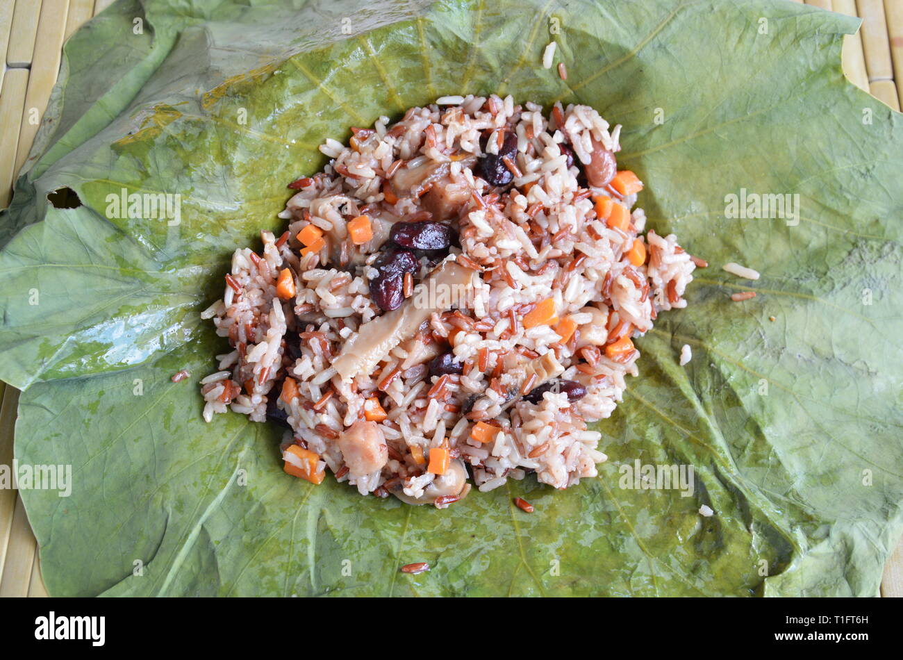 steamed rice and whole grain wrapped in lotus leaf Stock Photo - Alamy