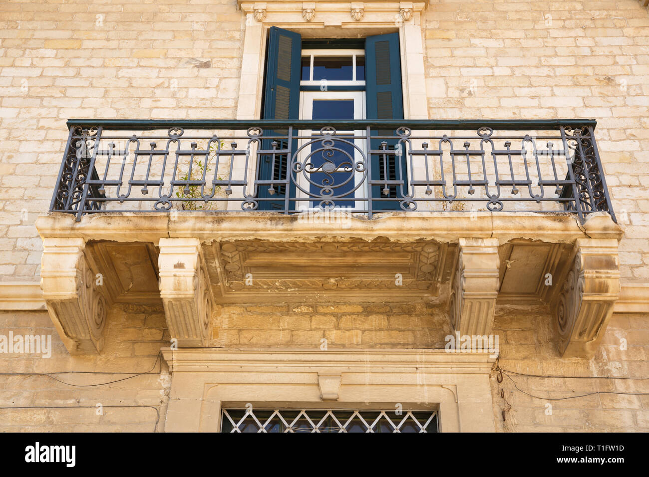 Old building with beautiful balcony in Limassol, Cyprus Stock Photo - Alamy