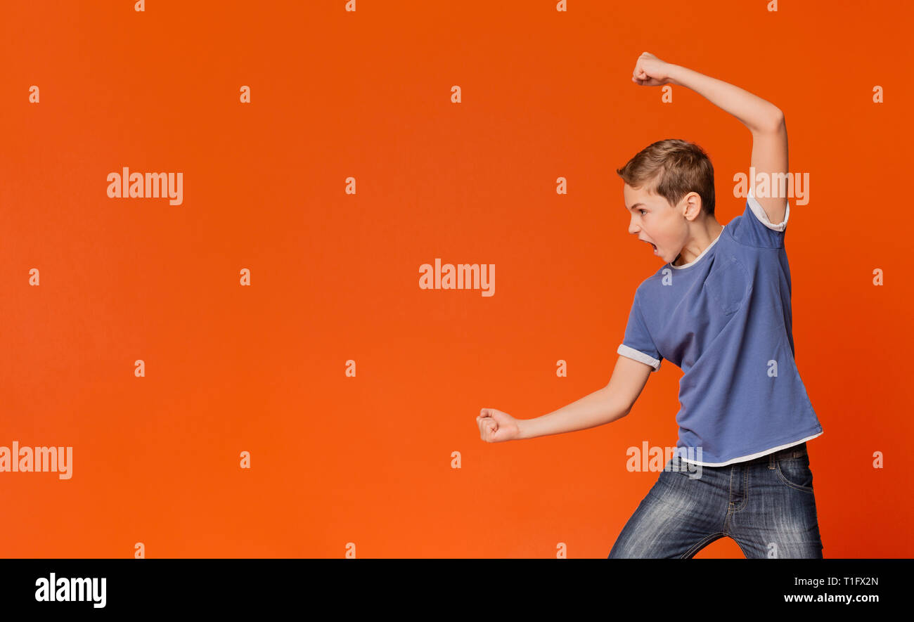 Angry irritated furious boy ready to fight Stock Photo - Alamy