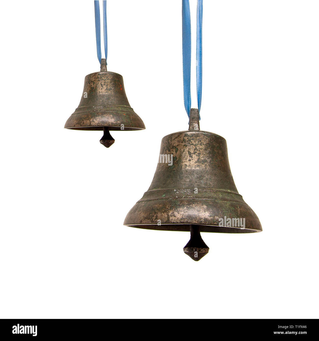 Two bronze bells hanging on blue ribbons on a white background Stock ...