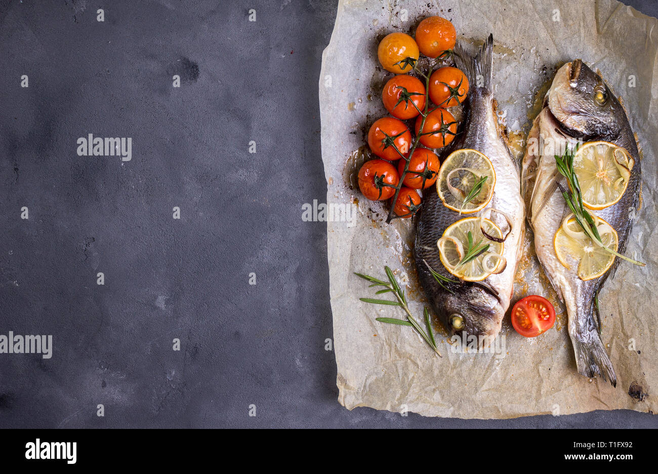 Baked fish background Stock Photo - Alamy