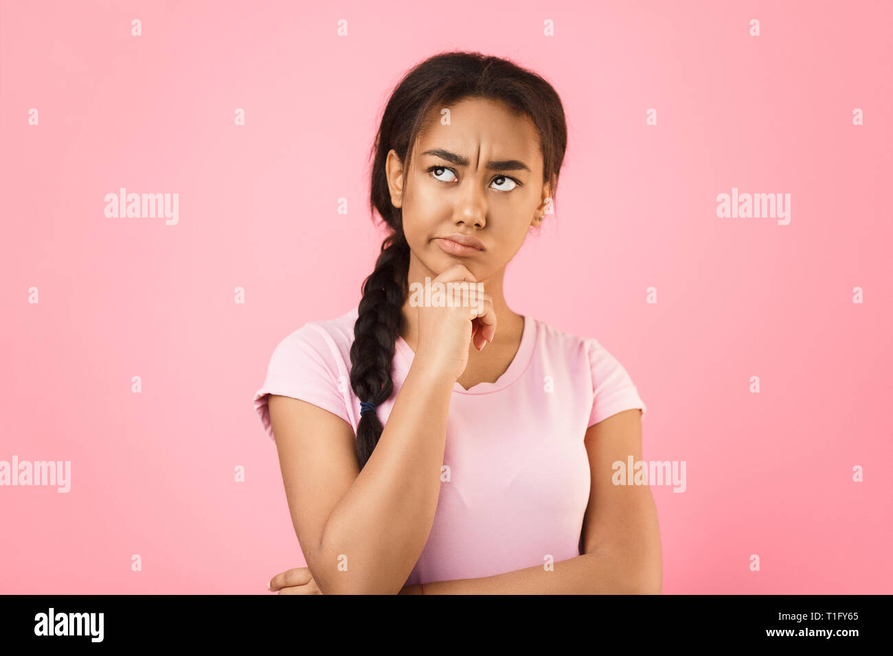 Teen girl thinking portrait young black hi-res stock photography and ...