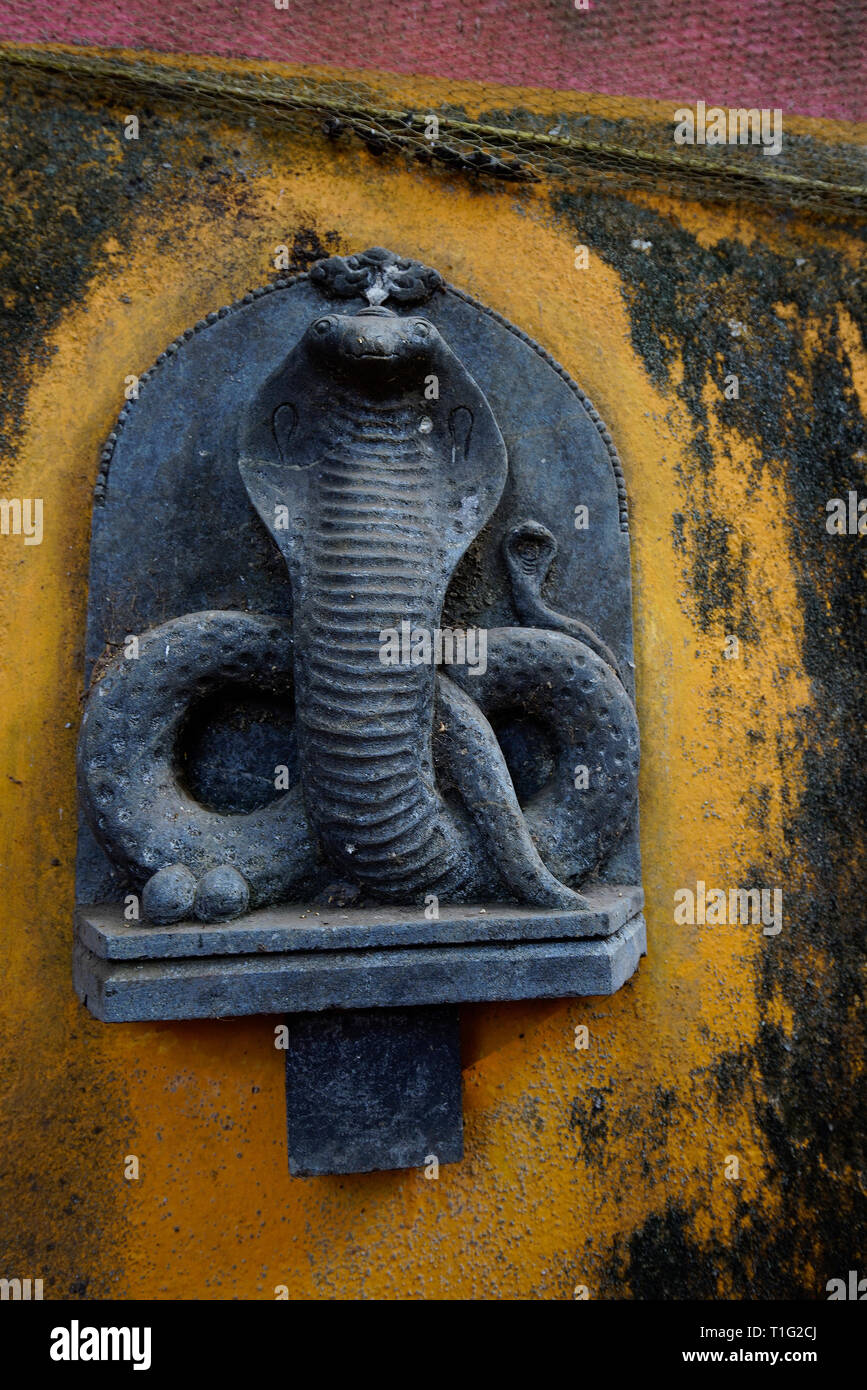 Temple in South India with cobra statue Stock Photo - Alamy
