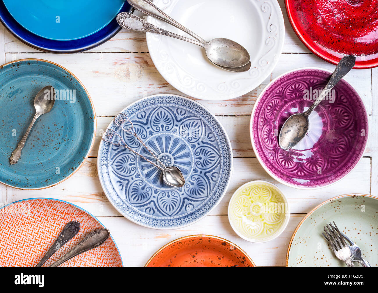 Set of different empty plates Stock Photo - Alamy