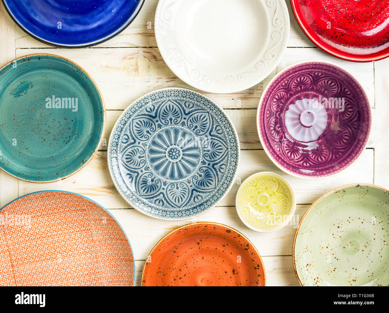 Set of different empty plates Stock Photo - Alamy