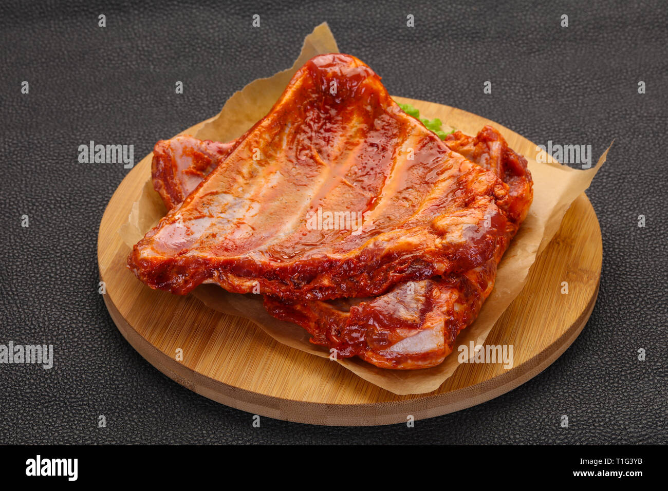 Raw marinated pork ribs ready for cooking Stock Photo - Alamy