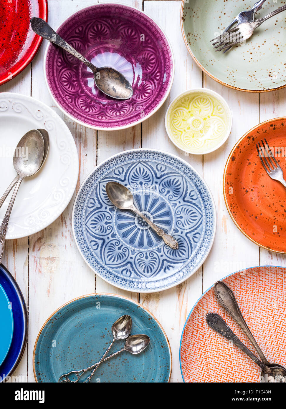 Set of different empty plates Stock Photo - Alamy