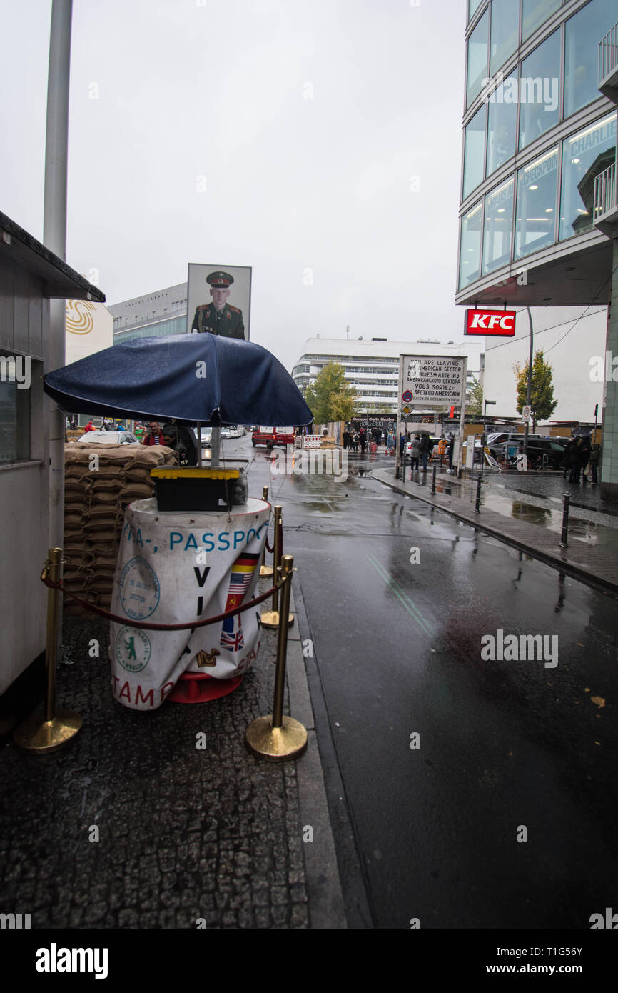 KFC at checkpoint Charlie Berlin Germany in the rain passports passport ...