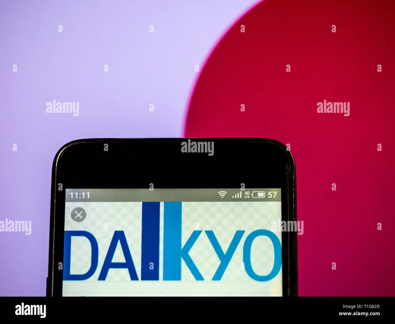 In this photo illustration a Daikyo Incorporated logo seen displayed on ...