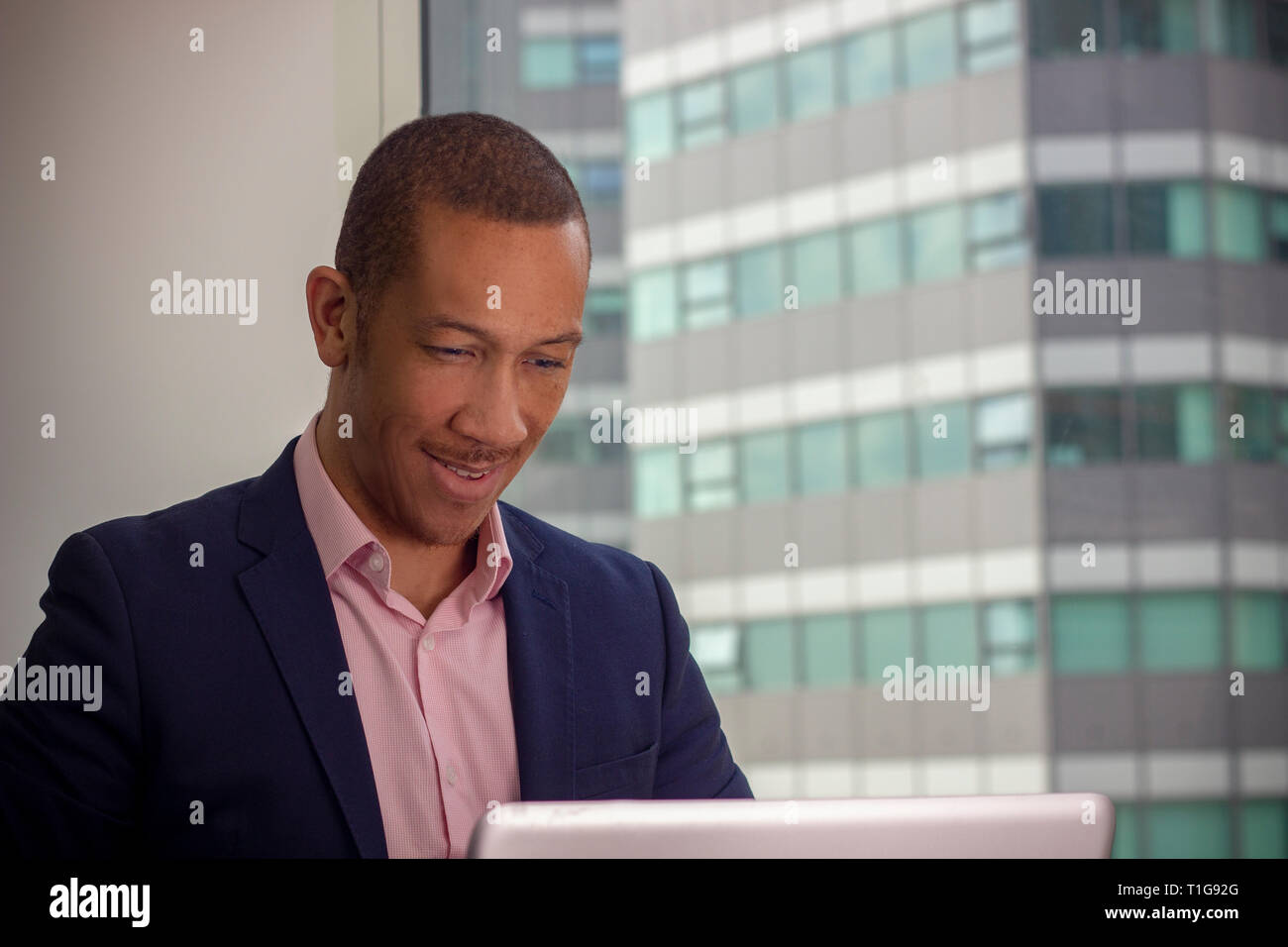 Suit smiling industry hi-res stock photography and images - Alamy